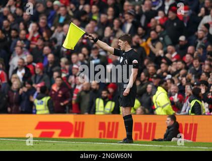 The linesman holds the offside flag Stock Photo - Alamy