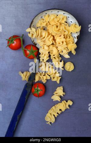 Pasta Capricci, pasta made from durum wheat semolina and tomatoes Stock ...