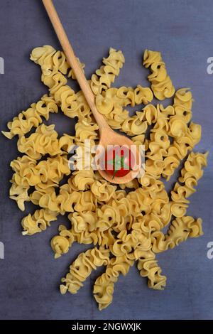Pasta Capricci, pasta made from durum wheat semolina and tomatoes Stock ...