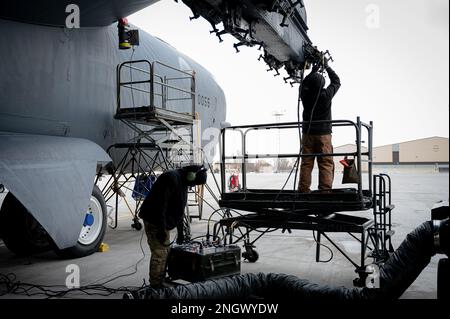Crew chiefs with the 5th Bomb Wing prepare a b-52H Stratofortress pylon ...