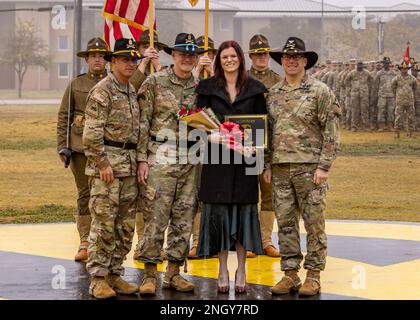 Command Sgt. Maj. Ian Field, 7, stands with his squad during a farewell ...