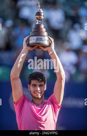 Carlos Alcaraz of Spain with the champion trophy and Alexander Zverev of Germany with the runner ...