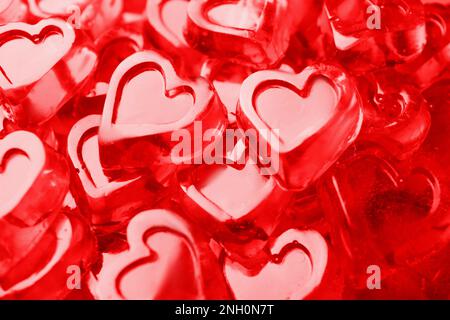Red heart shaped jelly candies background Stock Photo - Alamy