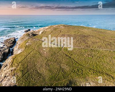 An aerial view of footpaths on Pentire Polint East and incoming tide on ...