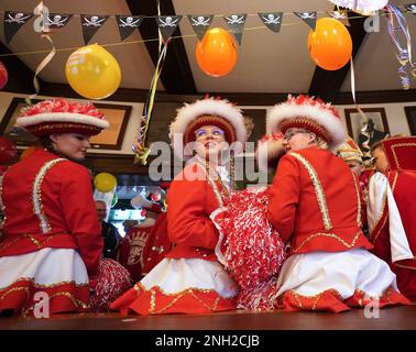 Marne, Germany. 20th Feb, 2023. Carnivalists celebrate during the Rose ...