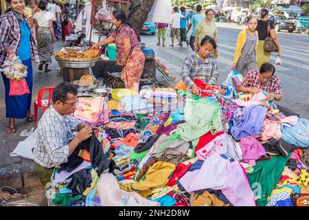 Urban scene from Maha Bandoola Road in Chinatown of Yangon. Myanmar is ...