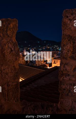 Night view of Carini town from a window of the La Grua-Talamanca castle ...