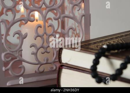 burning candle in censer. quran and tasbih. prayer and Ramadan Stock ...