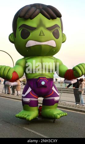 Evening carnival parade with an inflated Incredible Hulk in the Spanish ...