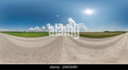 360° view of 360 hdri panorama on no traffic gravel dusty road among ...