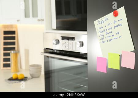 To do list and sticky notes on fridge in kitchen. Space for text Stock ...