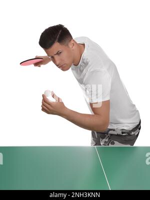 Portrait of concentrated ping pong player going to hit an orange ball ...