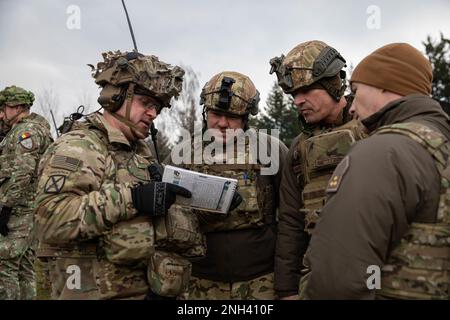 Leaders from the Hungarian and Romanian Army observe Soldiers assigned to the 1st Battalion ...