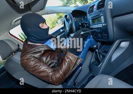 Car theft, symbol photo, car thief Stock Photo - Alamy