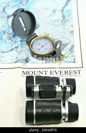 compass knife and binocular on map Stock Photo - Alamy