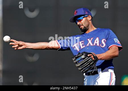 Texas Rangers Leody Taveras throws during spring training baseball ...