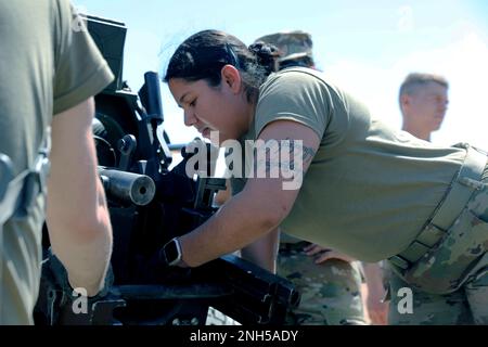 U.S. Army cannon crewmember Spc. Colin Grebner, assigned to Bravo ...