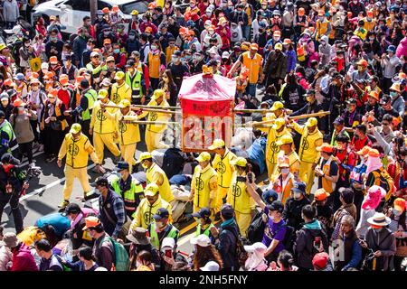 During the Baishatun Mazu Pilgrimage in Taiwan, lots of pilgrims would ...
