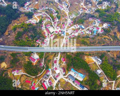 ANQING, CHINA - FEBRUARY 21, 2023 - A highway passes through a village ...