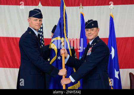 The ceremonial passing of the guidon from the outgoing commander to the ...