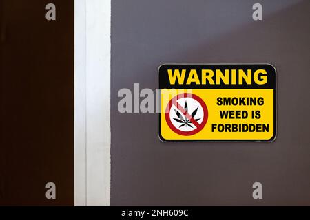 A no smoking sign on the side of a container with cylinders inside ...