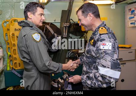 Royal Australian Navy (RAN) Commodore Ivan Ingham (center), Commodore ...