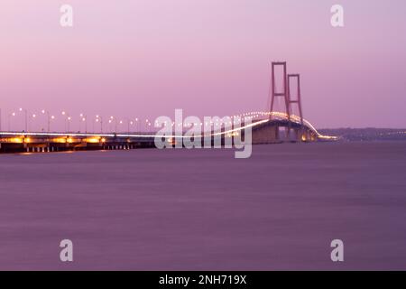 Suramadu Bridge at twilight with colorful sunset in Surabaya, Indonesia ...