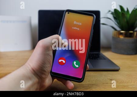 Phone call from boss. Incoming call from boss concept Stock Photo - Alamy