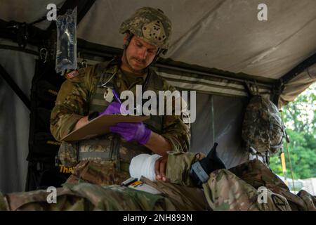 Staff Sgt. Jacob Lewis, medical treatment noncommissioned officer in ...