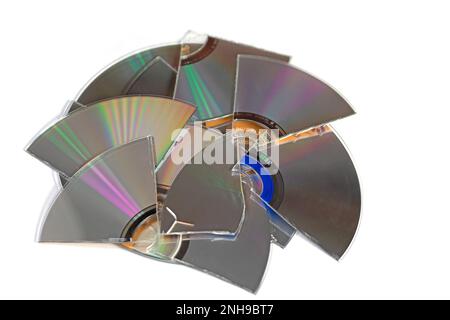 Shredded DVD against white background Stock Photo - Alamy