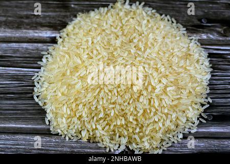 Yellow golden Basmati rice, a variety of long, slender-grained aromatic ...