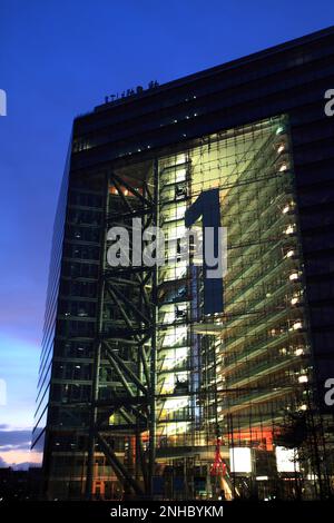 The Stadttor building (city gate ) in the Neuer Zollhof are at night ...