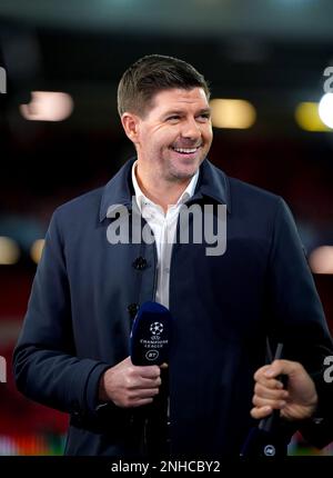 Former Liverpool player Steven Gerrard, center smiling, watches the ...