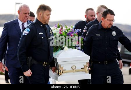 The caskets of Tausha Haight and her five children, Macie Lynn, 17 ...