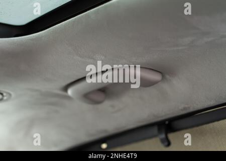 Modern car grab handle, car interior details. Car grab handler for the ...