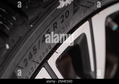 Close up view of tire with tire width, height and wheel diameter ...