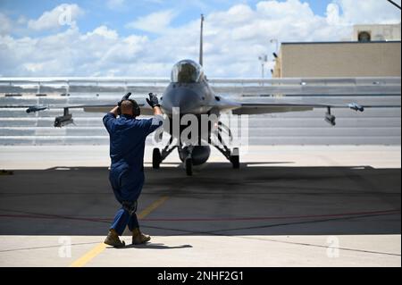 An F-16 crew chief from the 162nd Wing at Morris Air National Guard ...