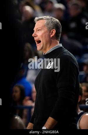 Utah State coach Ryan Odom talks to forward Taylor Funk during a ...