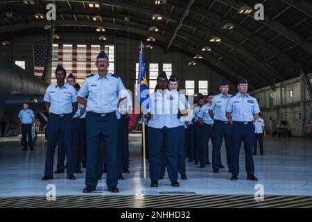 Airmen assigned to the 6th Operations Group stand in formation during ...