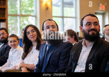 Friends and family members attend the awards ceremony of U.S. Army Air ...