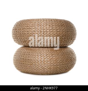 Two stylish wicker poufs on white background Stock Photo - Alamy