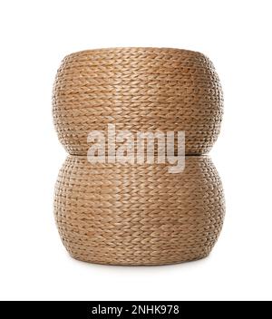 Two stylish wicker poufs on white background Stock Photo - Alamy
