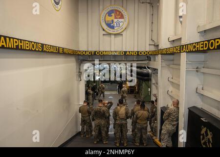 Marines prepare to embark the well deck of USS Germantown Stock Photo ...