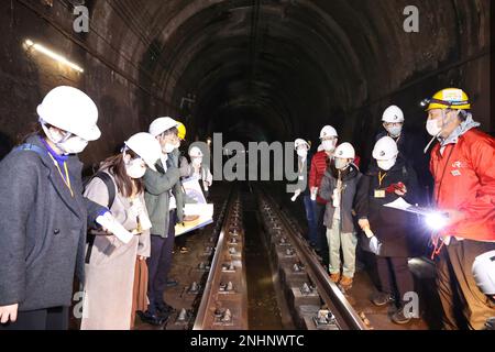 Visitors enjoy walking inside of the Kanmon Railway Tunnel during an ...