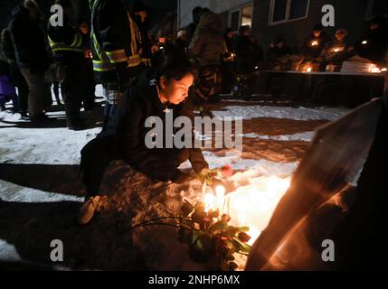 Family and friends of three murdered women gather at a vigil in ...