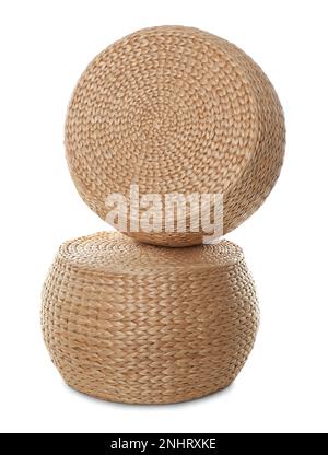 Two stylish wicker poufs on white background Stock Photo - Alamy