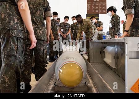 An AGM-65 air-to-ground missile loaded on the underside of an A-10 ...