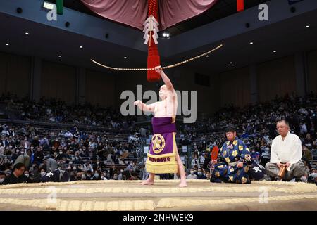 A sumo wrestler Satonofuji attends the bow twirling ceremony during ...