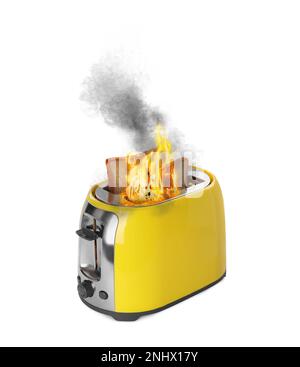 Toaster flaming up while cooking slices of bread on white wooden table ...