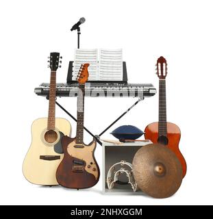 Set of different musical instruments and microphone on white background ...